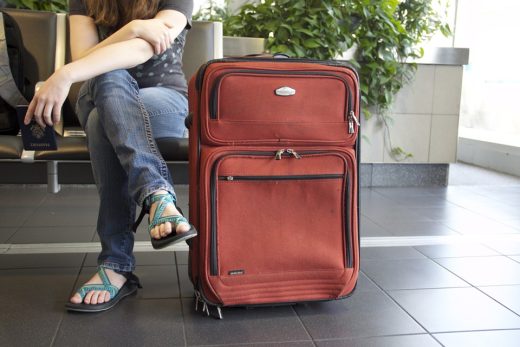 Checked Vs Carry On Luggage: Pros and Cons - Where The Road Forks
